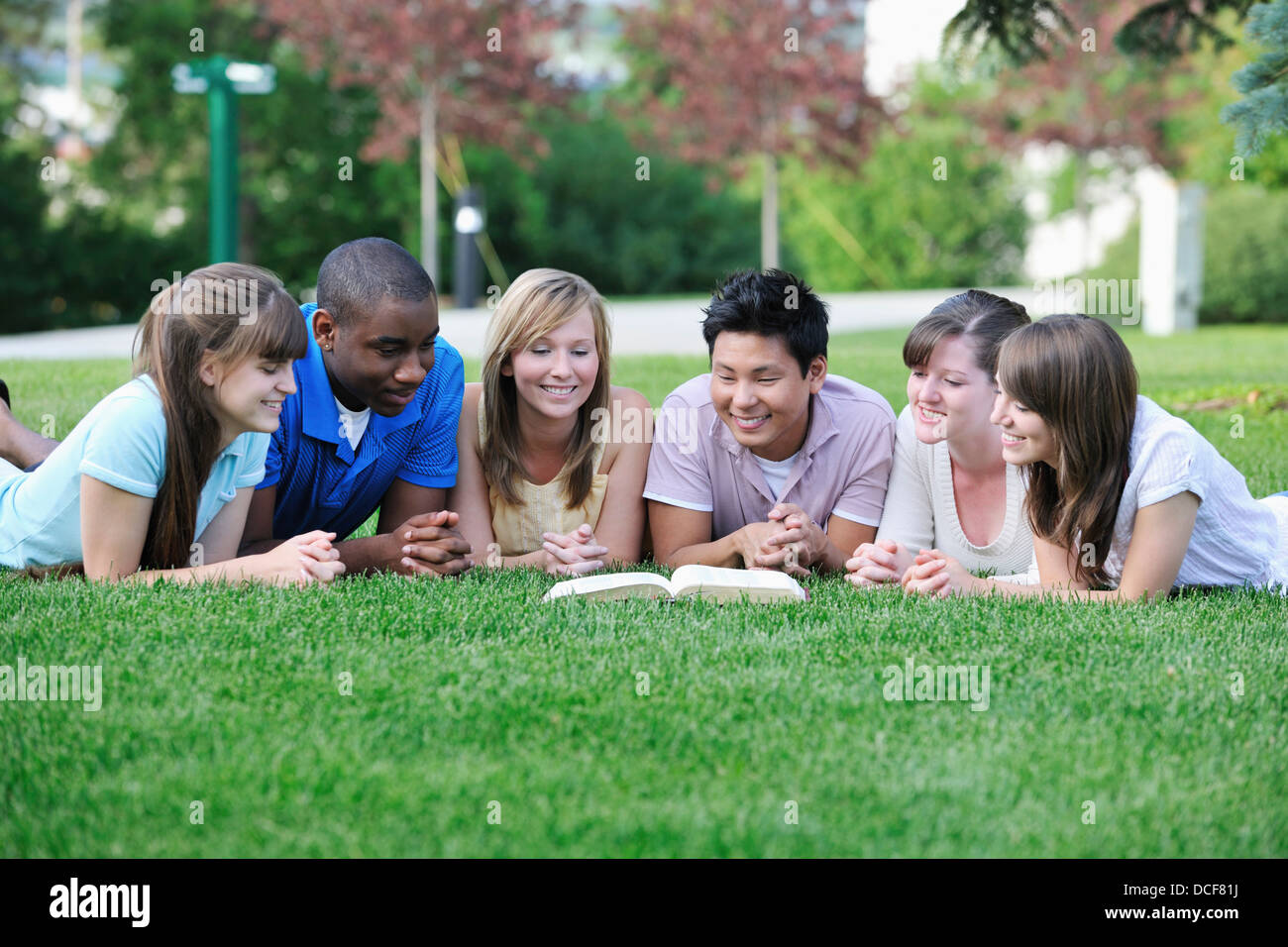 Group Of Friends Praying Together Stock Photo - Alamy