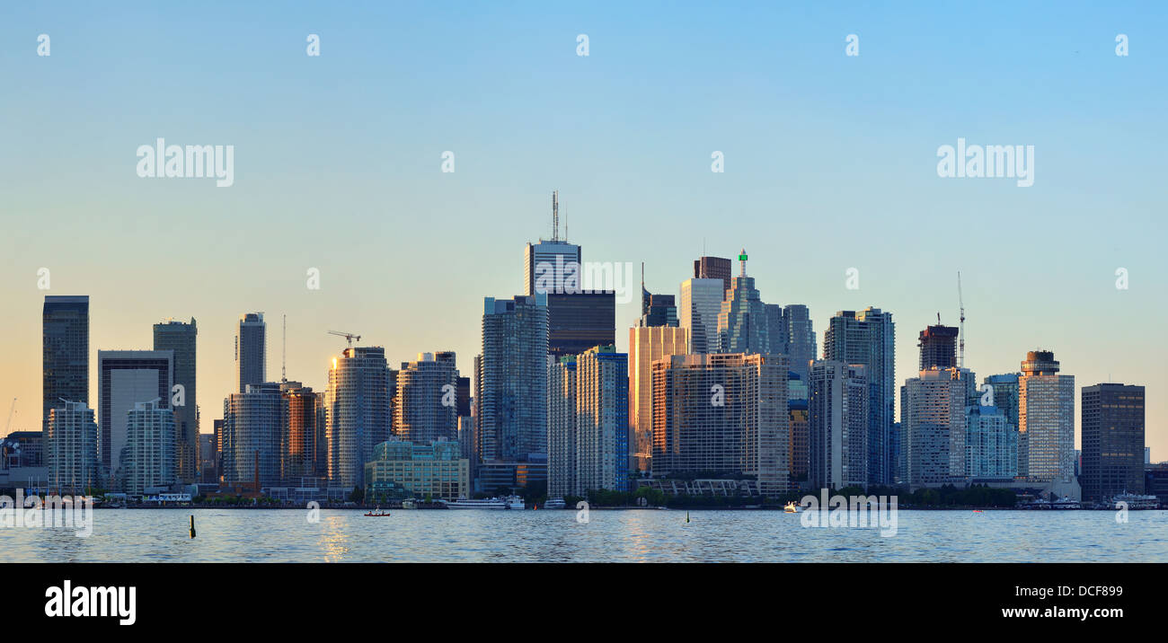 Toronto sunset over lake panorama with urban skyline Stock Photo - Alamy
