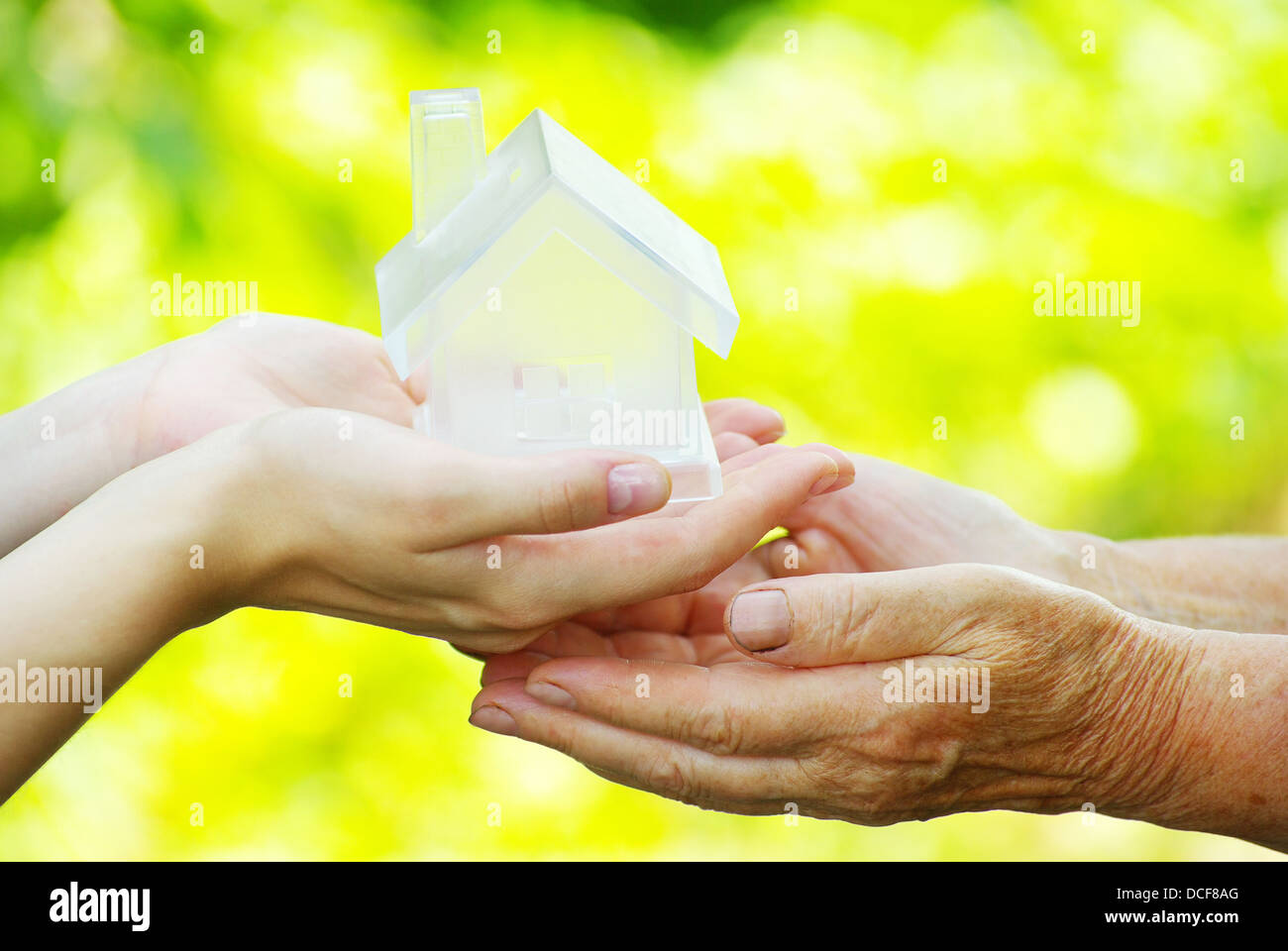 house in hand Stock Photo - Alamy