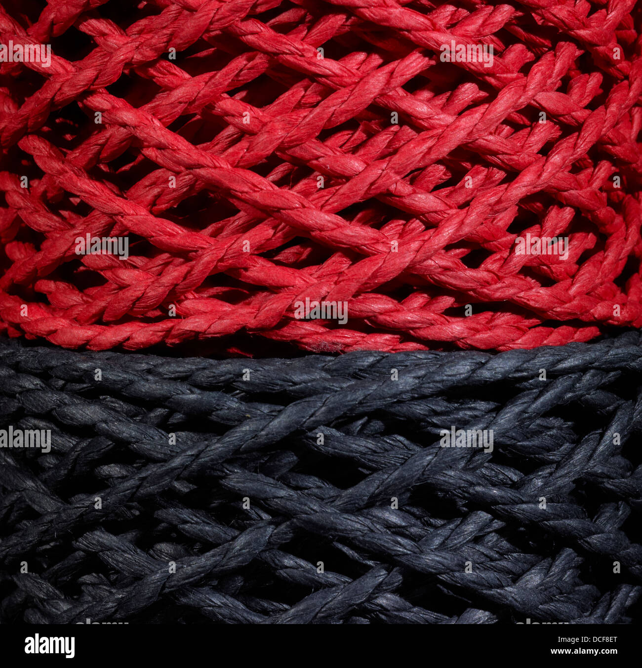 detail of two stacked red and black string coils Stock Photo - Alamy