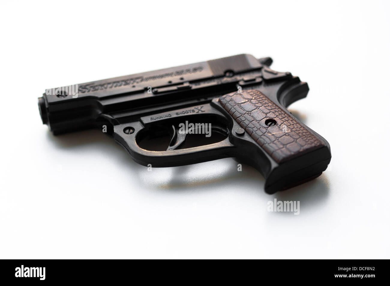 A toy weapon looks like a real one Stock Photo - Alamy