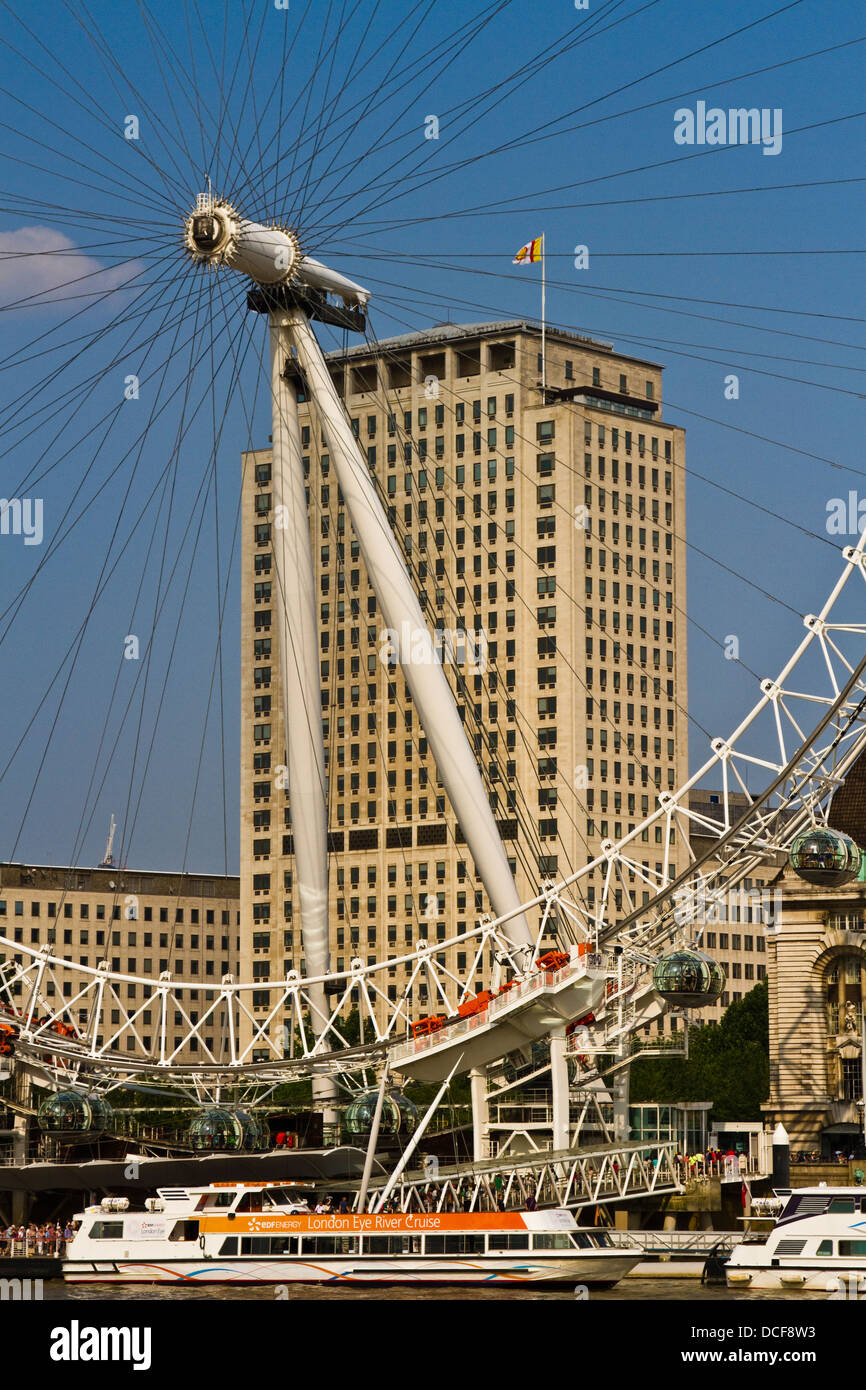 London eye behind building london hi-res stock photography and images ...