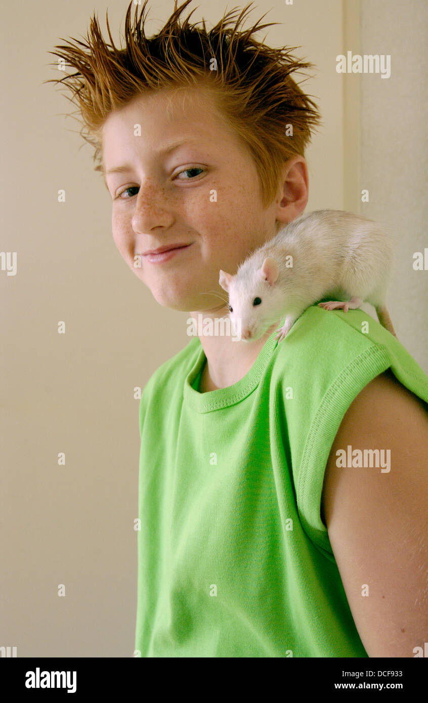 Teenage boy with his pet rat Stock Photo - Alamy