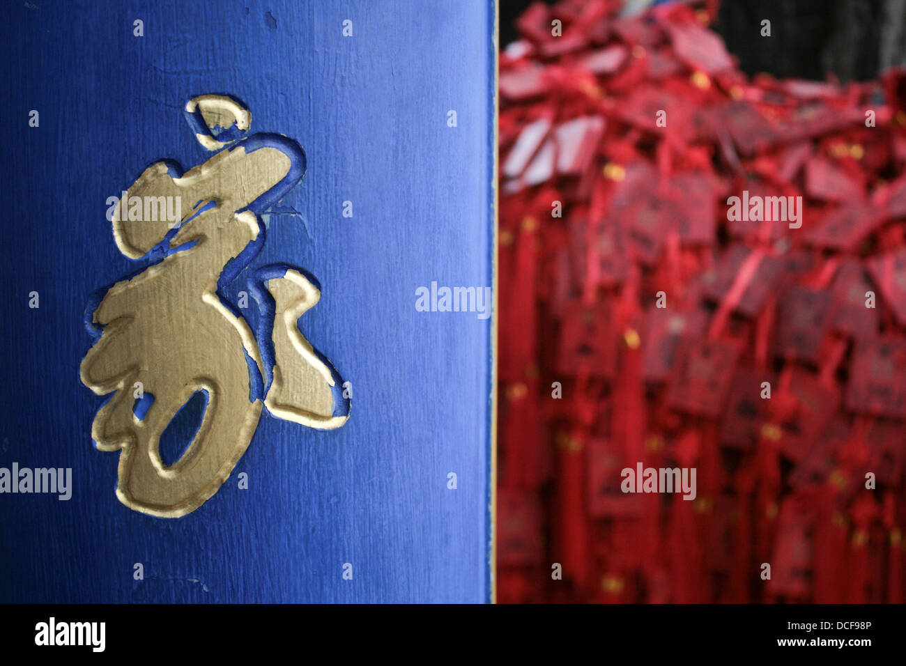 People place red tags on the 'blessing tree' like wishes. Dongyue ...