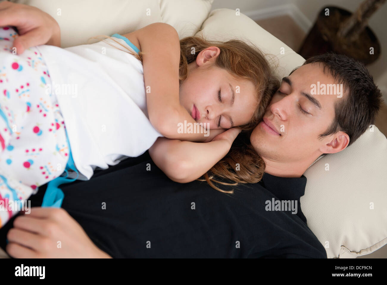Father And Daughter Napping Stock Photo - Alamy