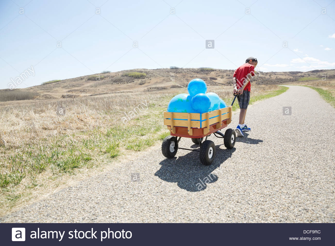 Cart pulling child hi-res stock photography and images - Alamy
