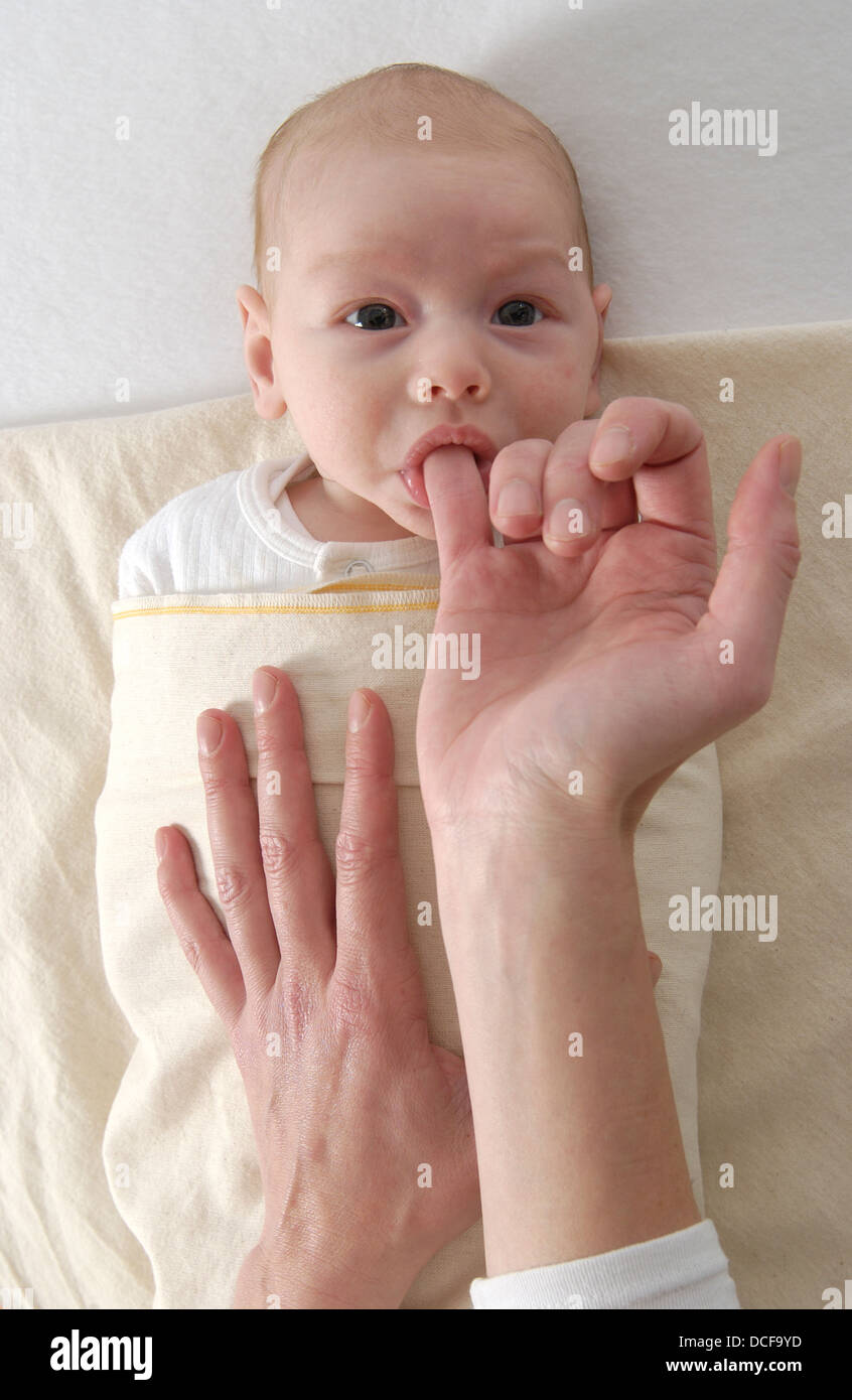 Newborn baby sucking mothers finger hi-res stock photography and images ...