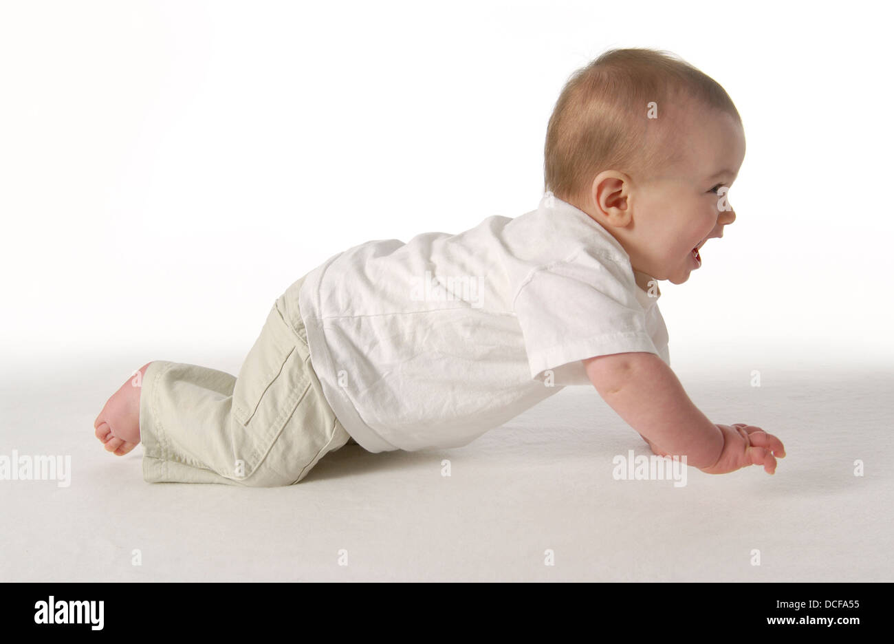 Crawling baby boy Stock Photo - Alamy