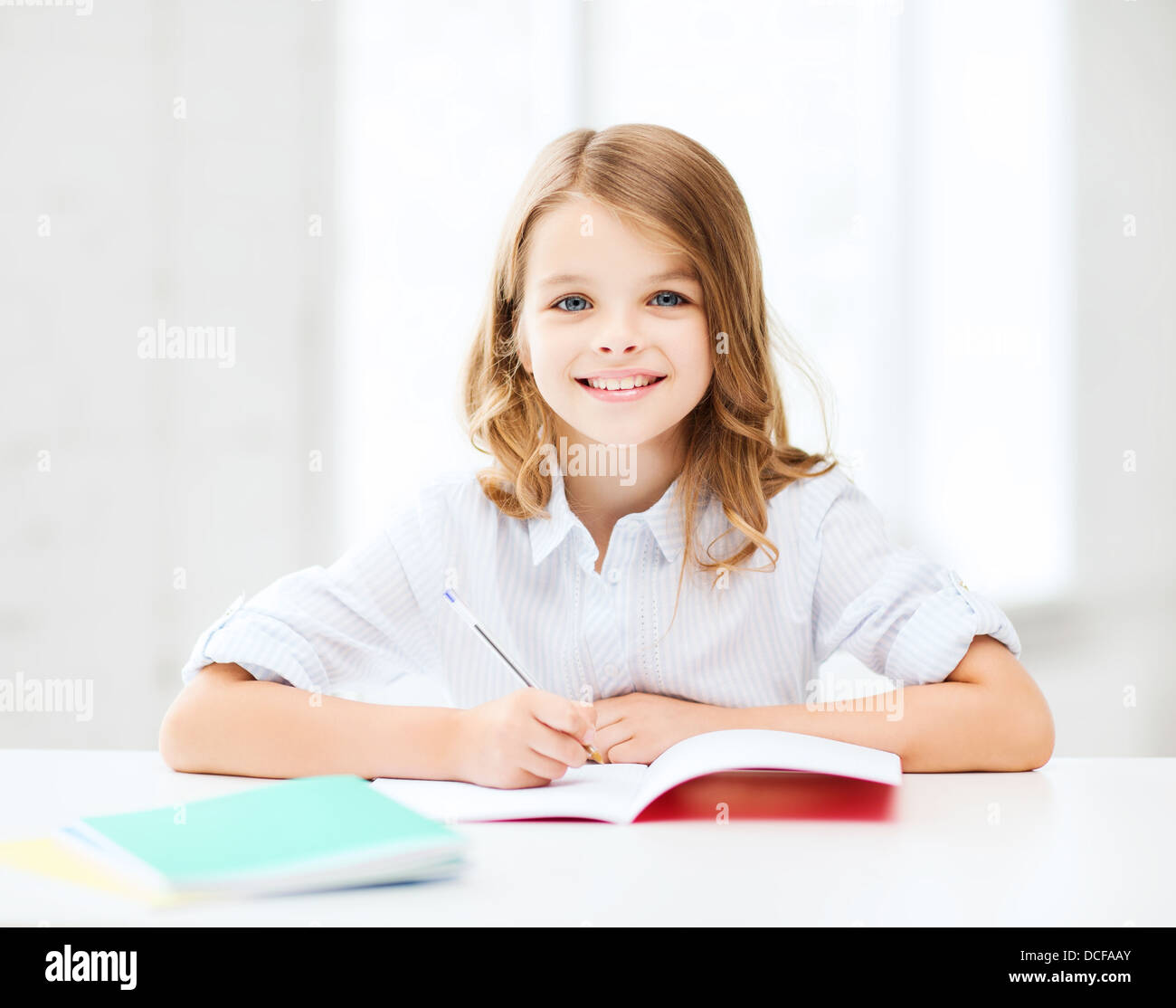 student girl studying at school Stock Photo - Alamy