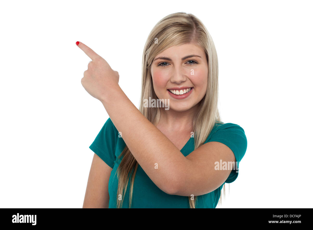 Stylish teen girl pointing her index finger away Stock Photo - Alamy