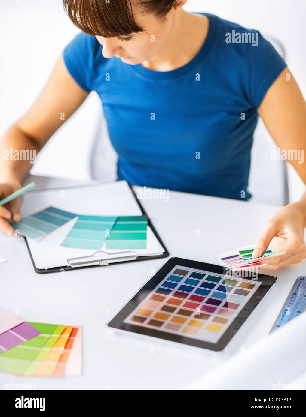 woman working with color samples for selection Stock Photo - Alamy