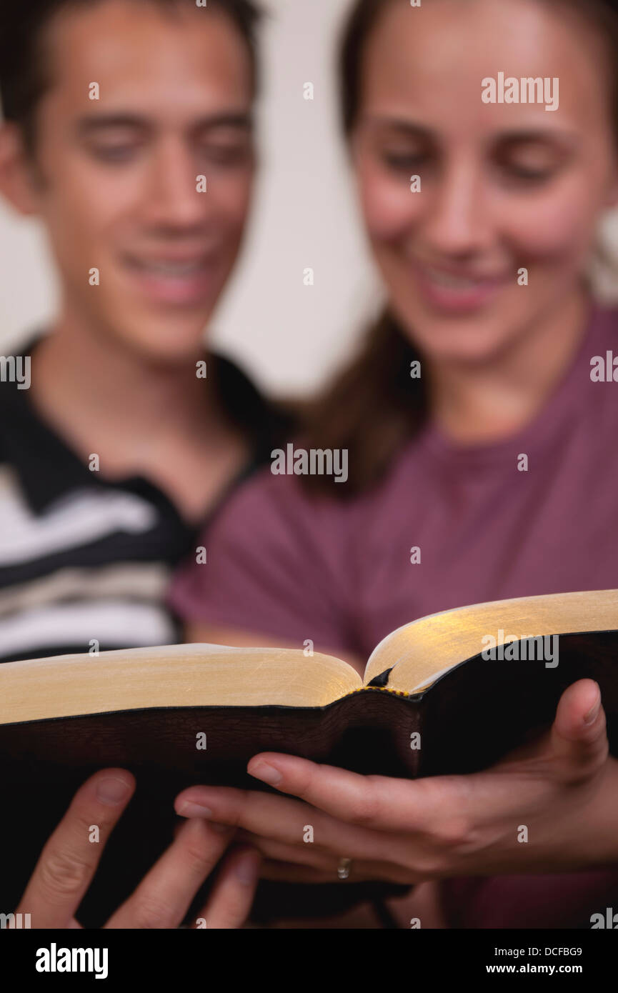 Father reading bible to family hi-res stock photography and images - Alamy