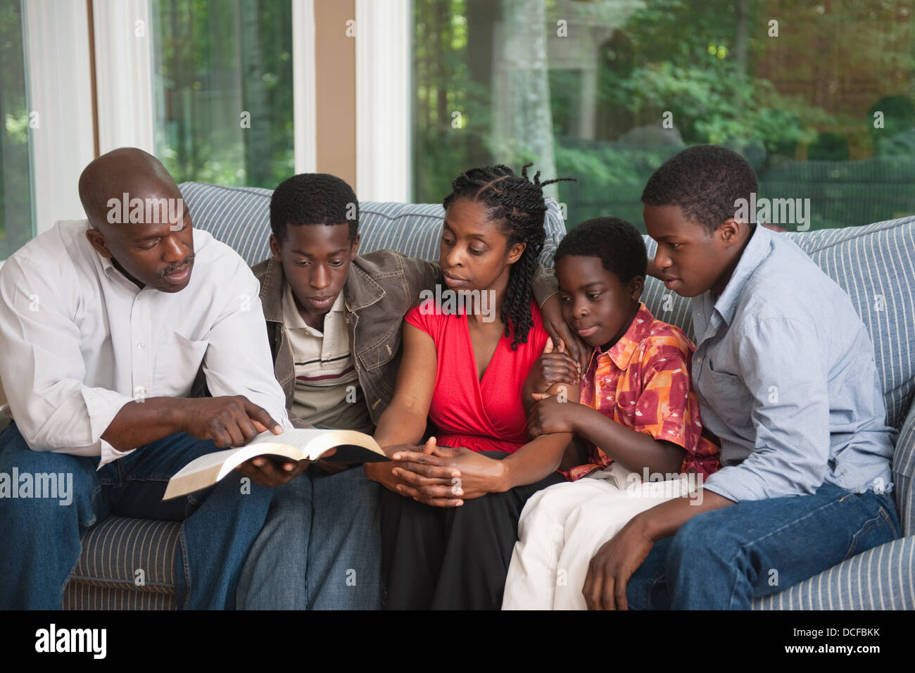 African american child reading bible hi-res stock photography and ...