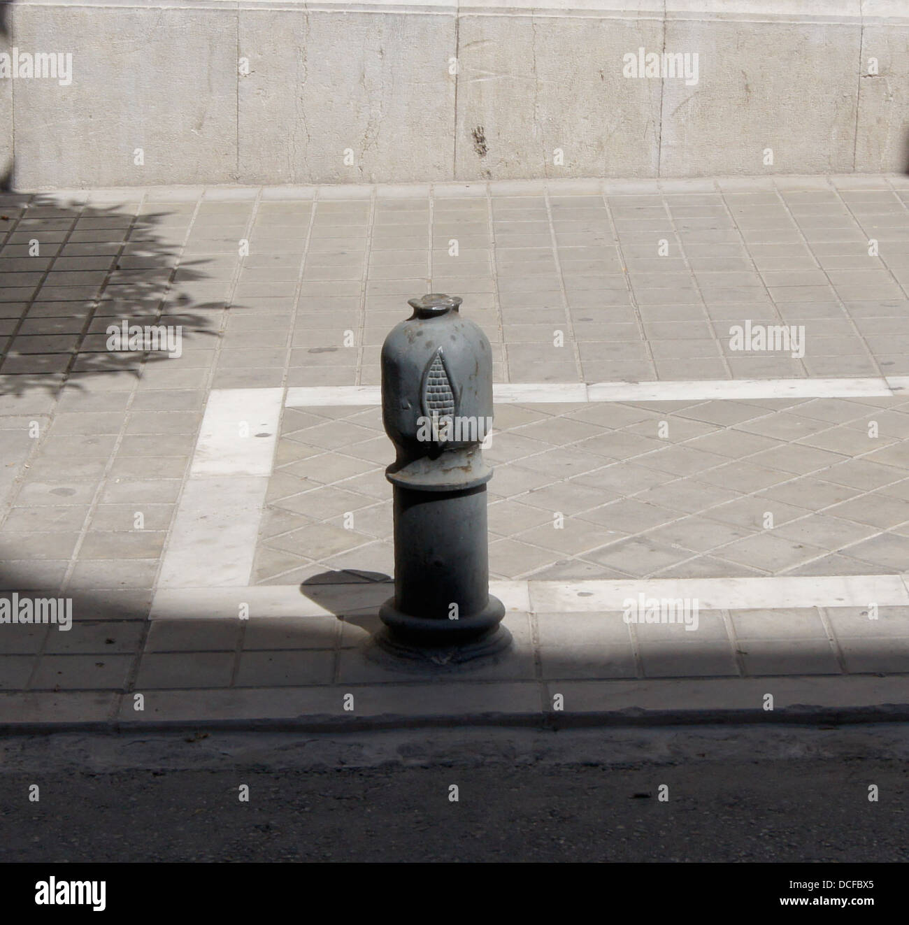 a pomegranate as traffic bollard, Granada, Spain Stock Photo - Alamy