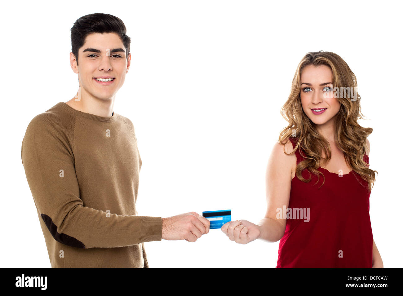 Handsome guy giving credit card to his girlfriend for shopping Stock ...