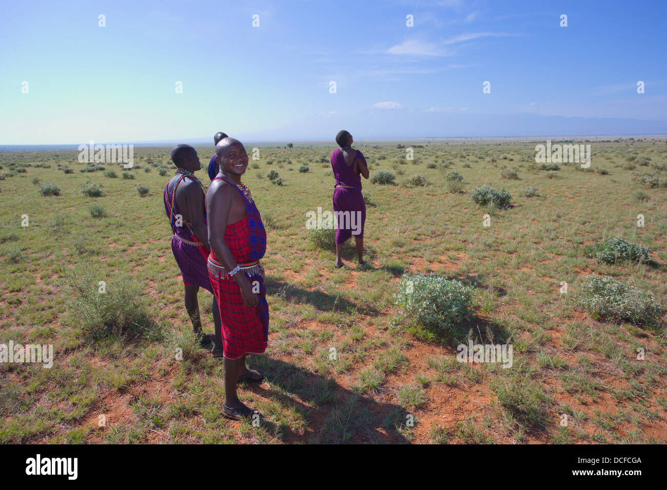 Masai Warriors flying a kite for the first time. Amboselli area. Kenya ...
