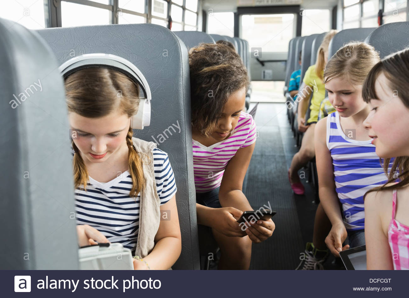 Sharing headphones bus hi-res stock photography and images - Alamy