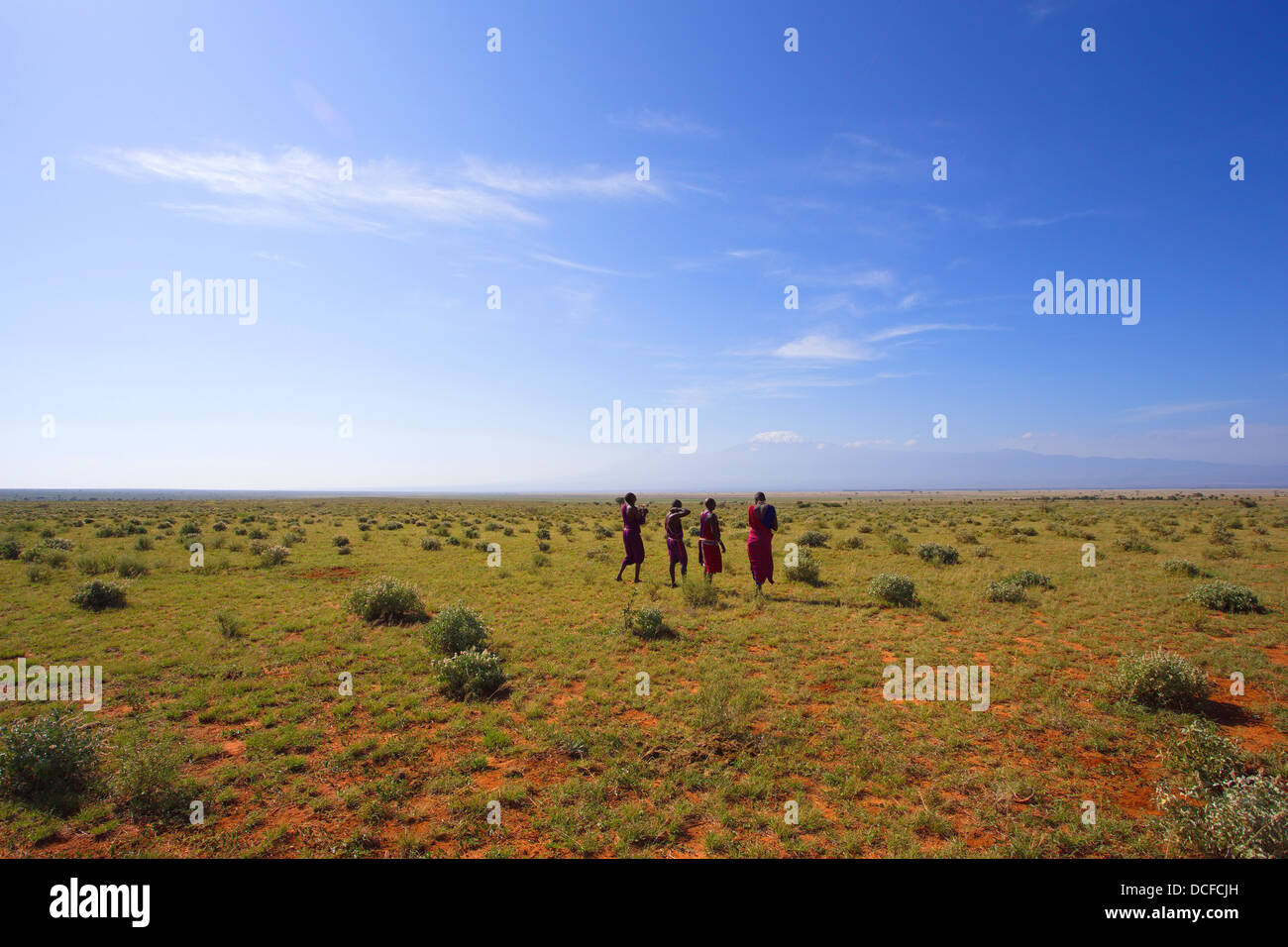 Masai Warriors flying a kite for the first time. Amboselli area. Kenya ...