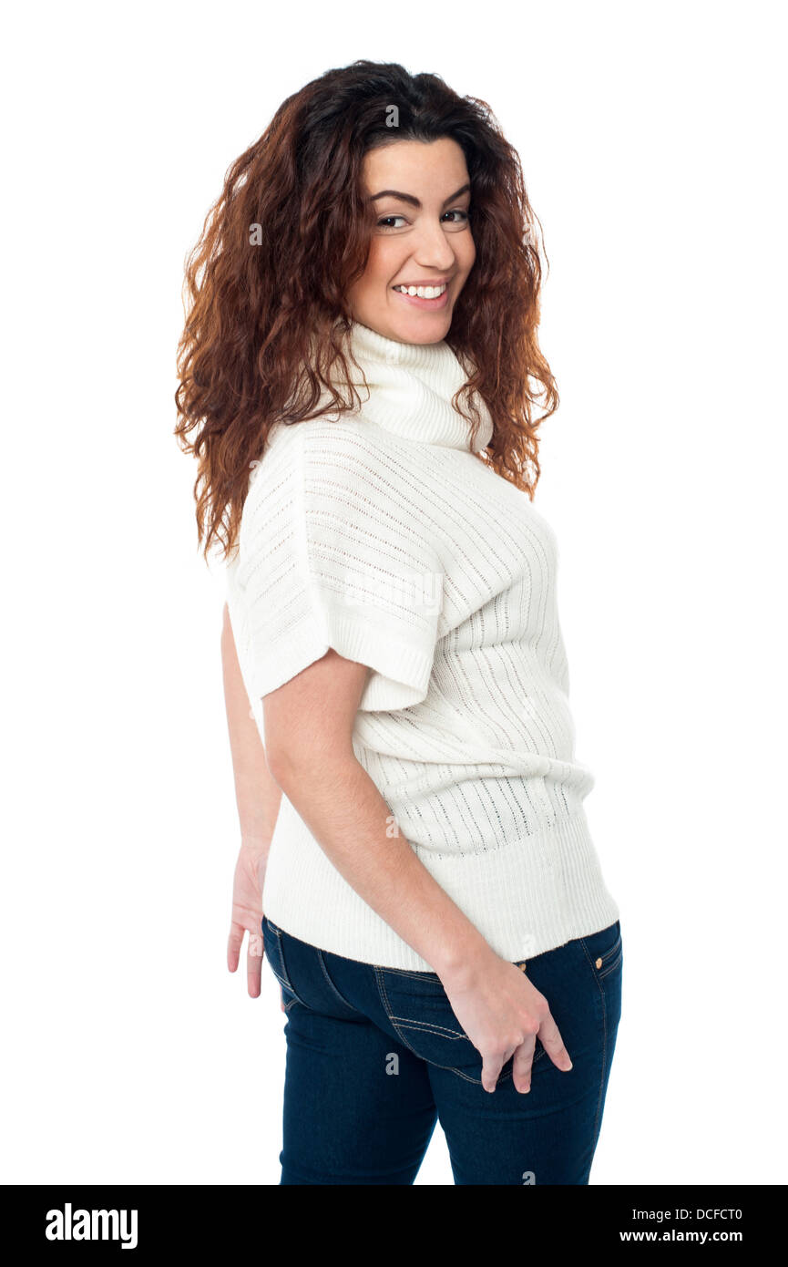 Gorgeous female turning back and smiling at you, white background Stock ...