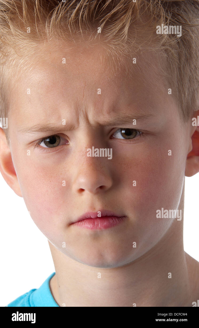 Portrait of an angry little boy Stock Photo - Alamy