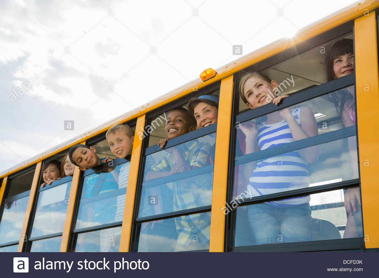Child looking through bus window hi-res stock photography and images ...