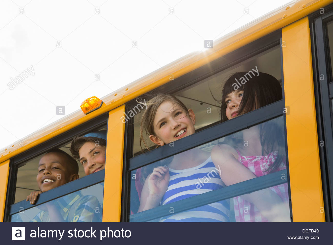 Child looking through bus window hi-res stock photography and images ...