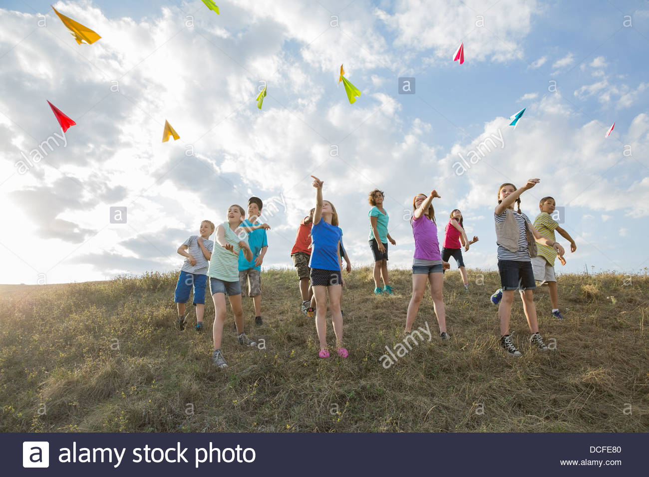 School children playing paper airplanes hi-res stock photography and ...