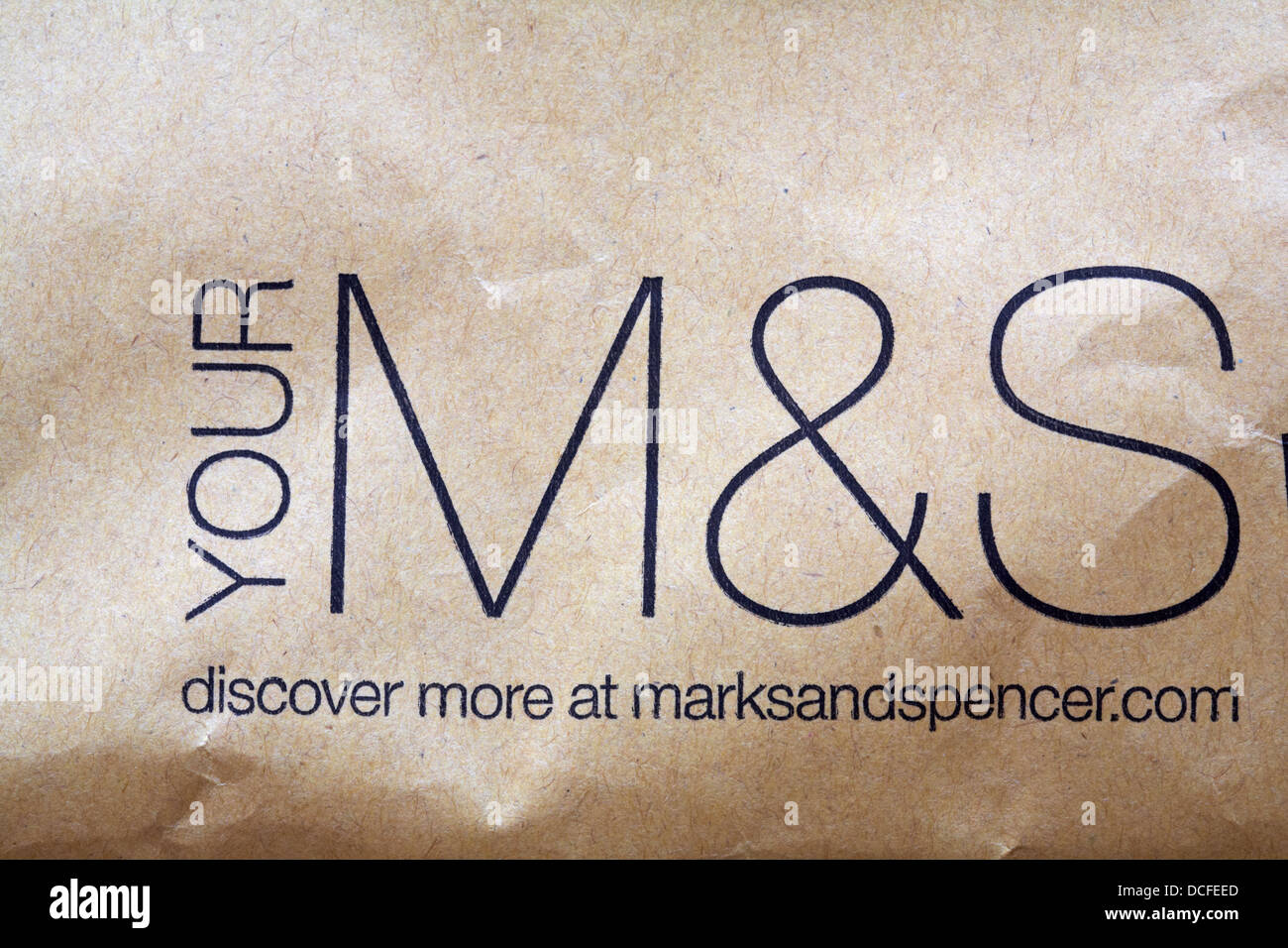 Your M&S discover more at marksandspencer.com on brown envelope Stock ...