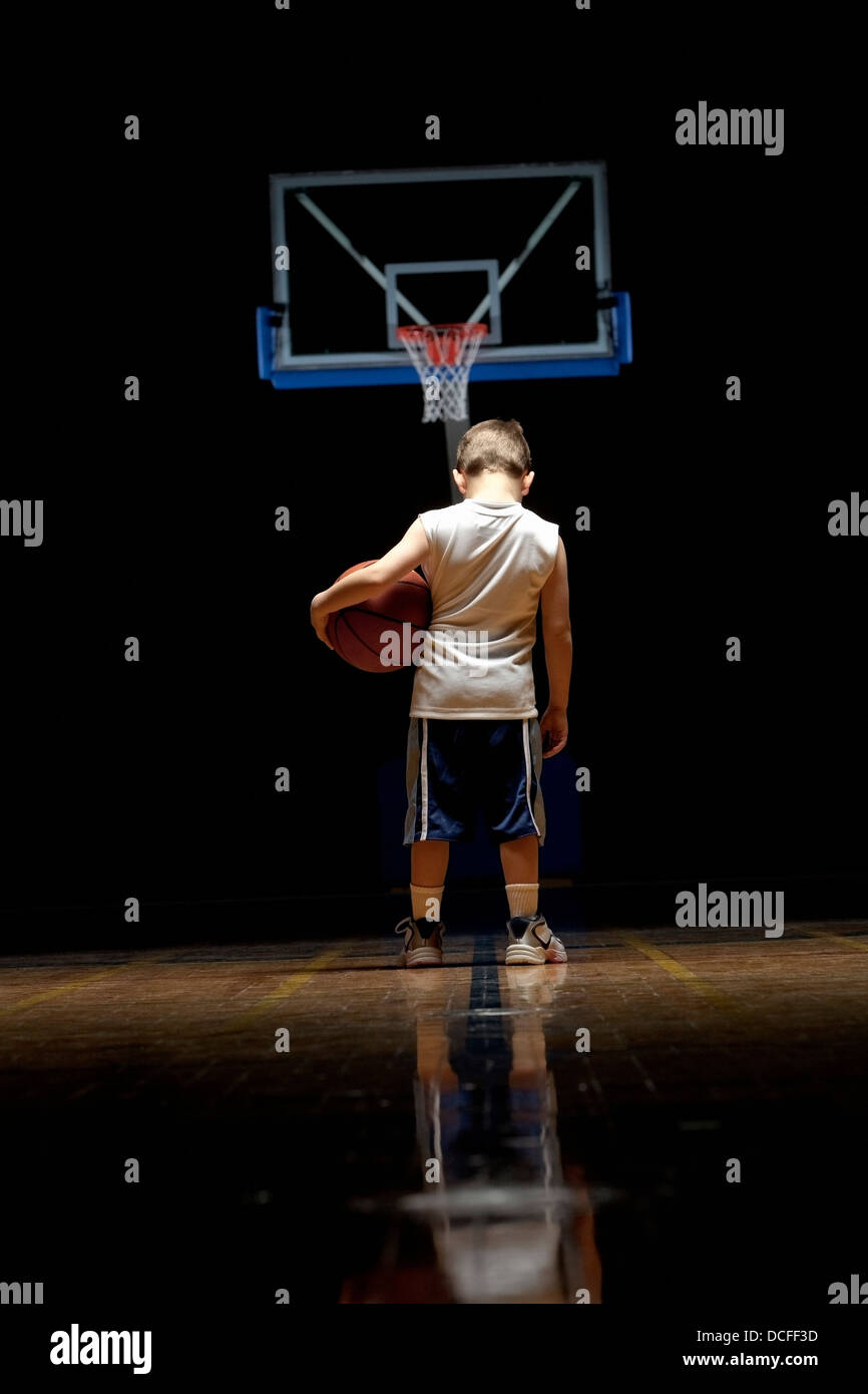 Kid Playing Basketball Alone