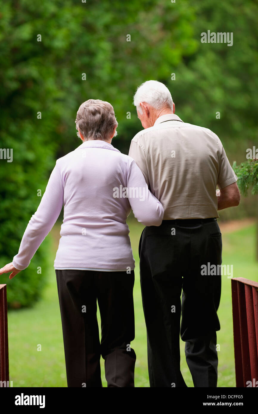 An Elderly Couple Walking Together Stock Photo - Alamy
