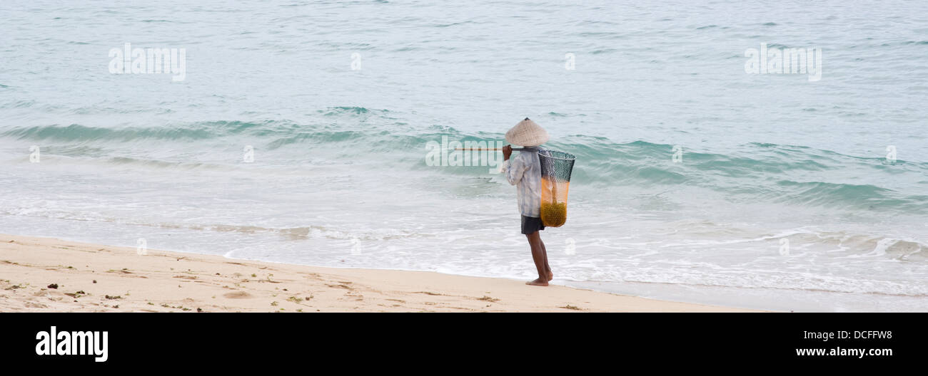 Person Walking On The Beach With A Fishing Net; Bali,Indonesia Stock ...