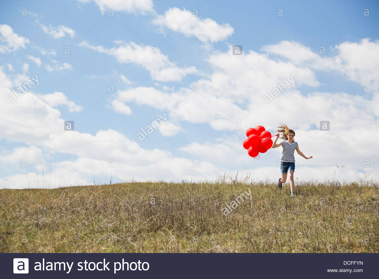 Red balloons hi-res stock photography and images - Alamy