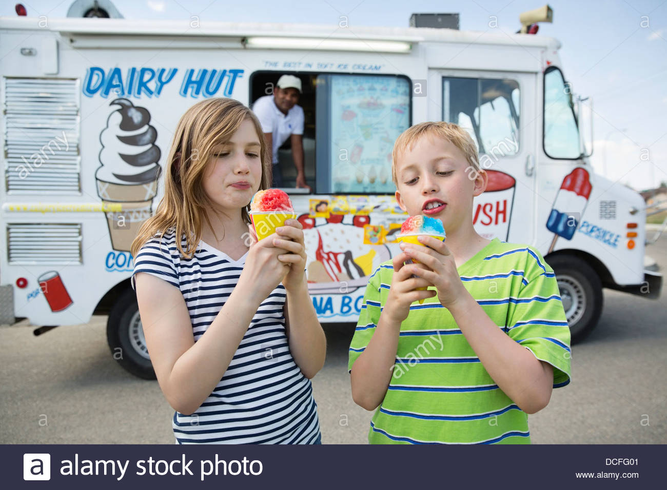 Friends eating snow cones together Stock Photo - Alamy