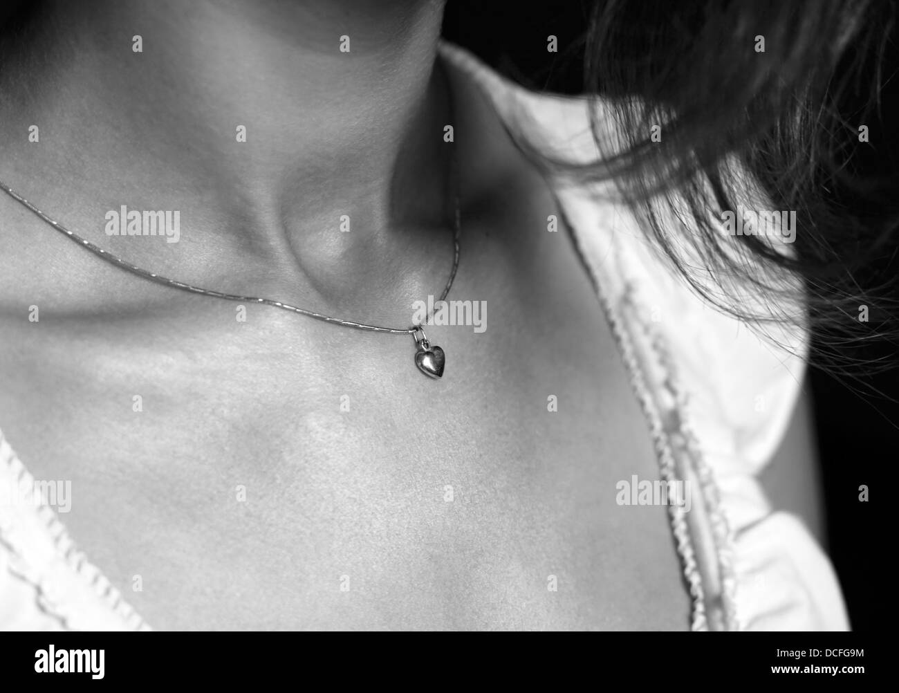Female neck with a chain Stock Photo - Alamy