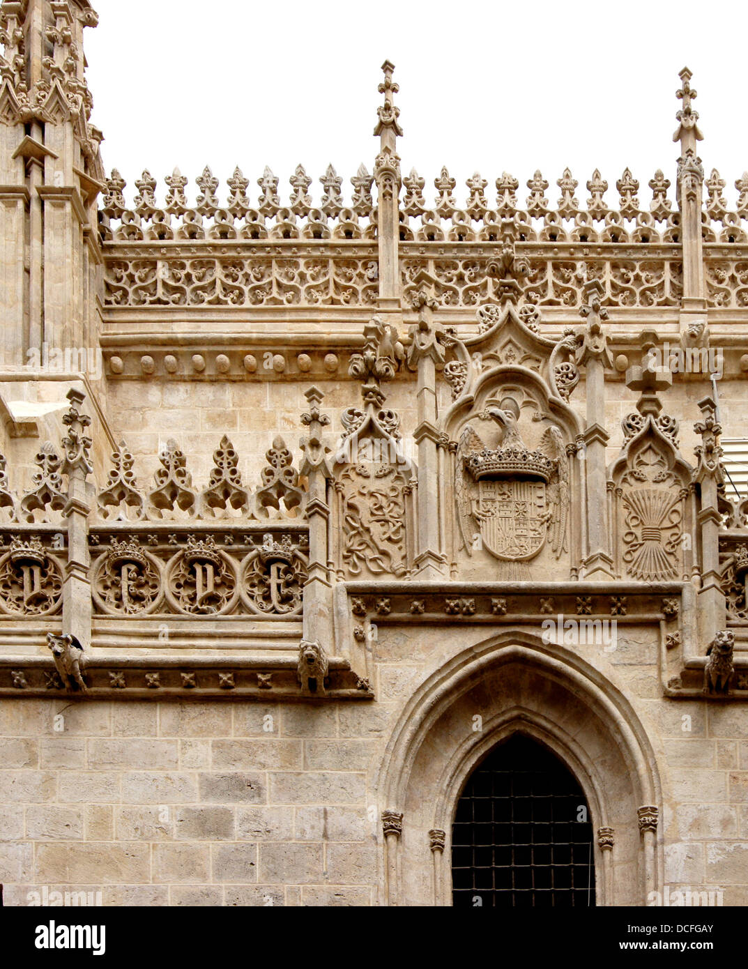 Capilla real de Granada, Spain. Symbols and coat of arms of Ferdinand ...