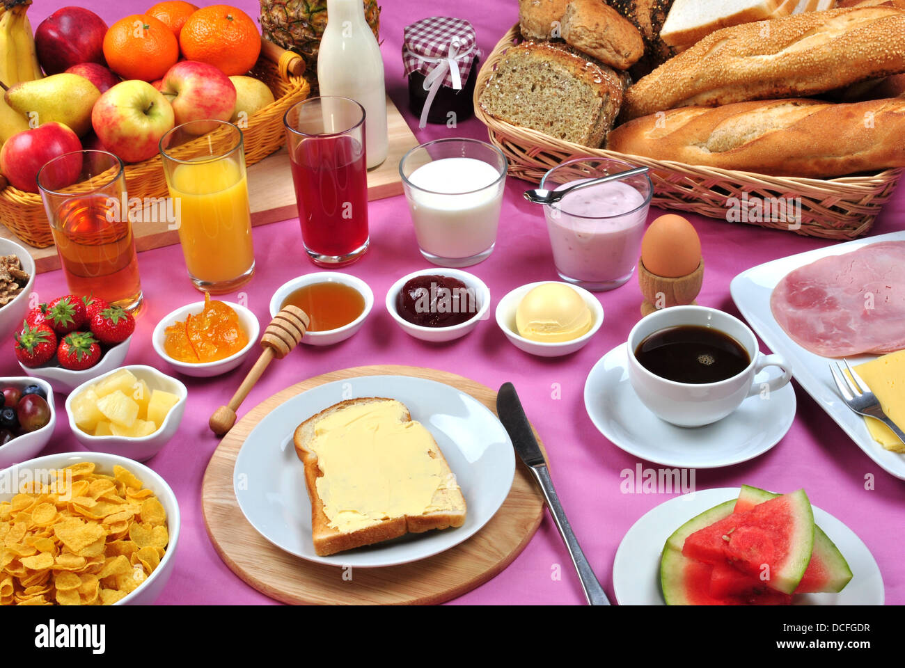 full breakfast with organic juice and jam Stock Photo - Alamy
