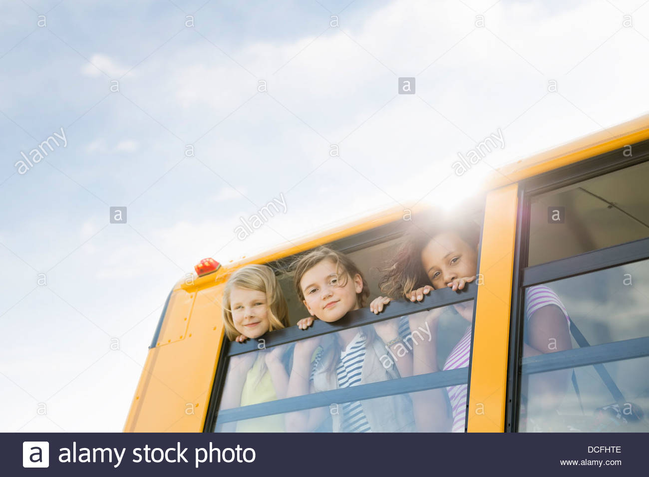 Child looking through bus window hi-res stock photography and images ...