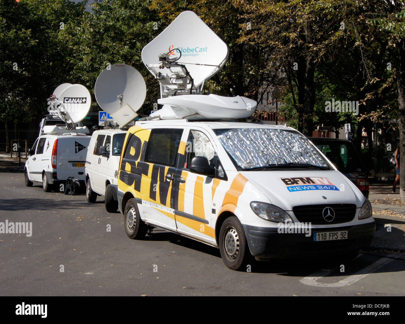 outside broadcasting vans of french TV channels Stock Photo - Alamy