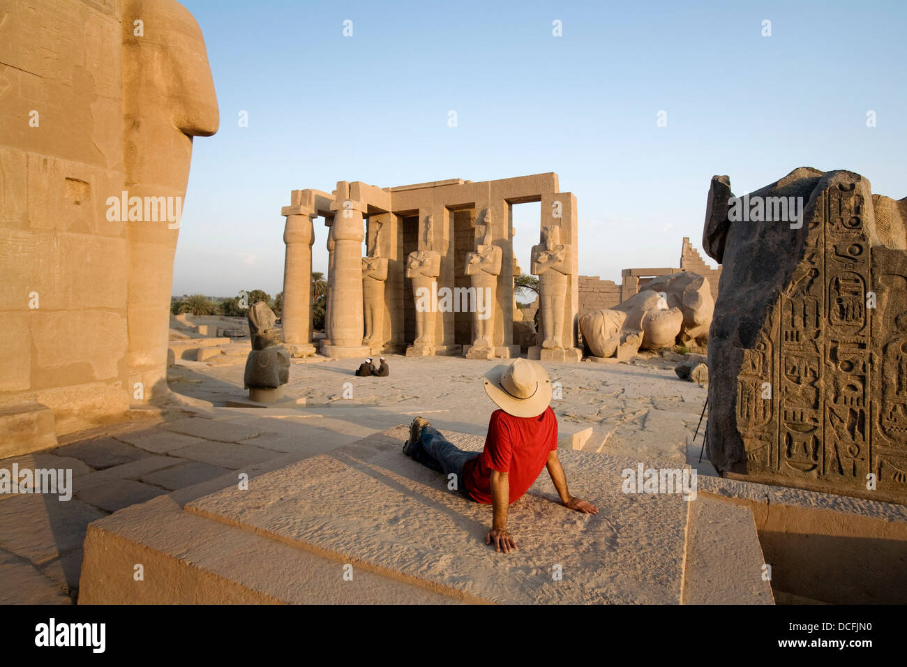 Man Sitting At Temple In Luxor Stock Photo - Alamy