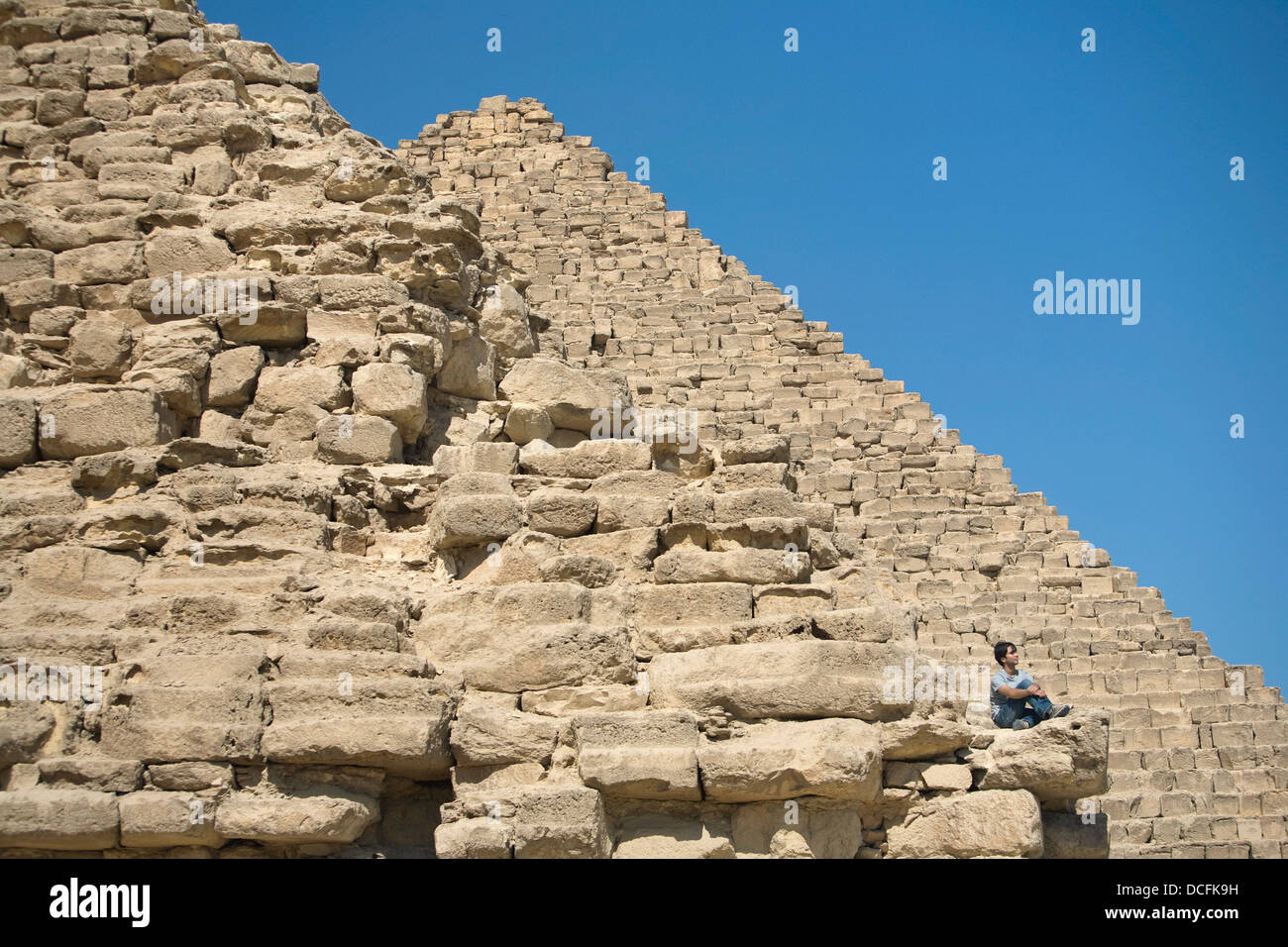 Man sitting on a pyramid hi-res stock photography and images - Alamy