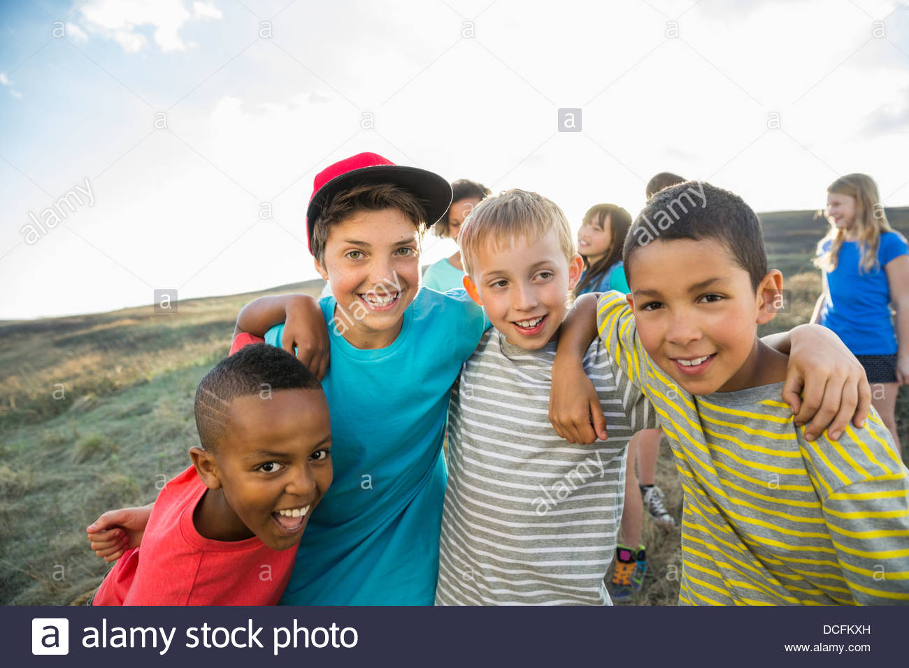 Children arms around each other hi-res stock photography and images - Alamy