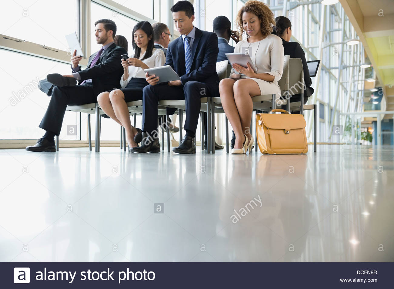 Group sitting hi-res stock photography and images - Alamy