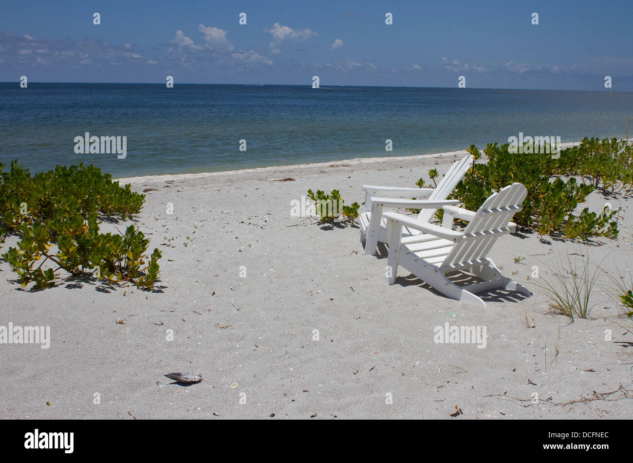 Two adirondack chairs on beach hi-res stock photography and images - Alamy