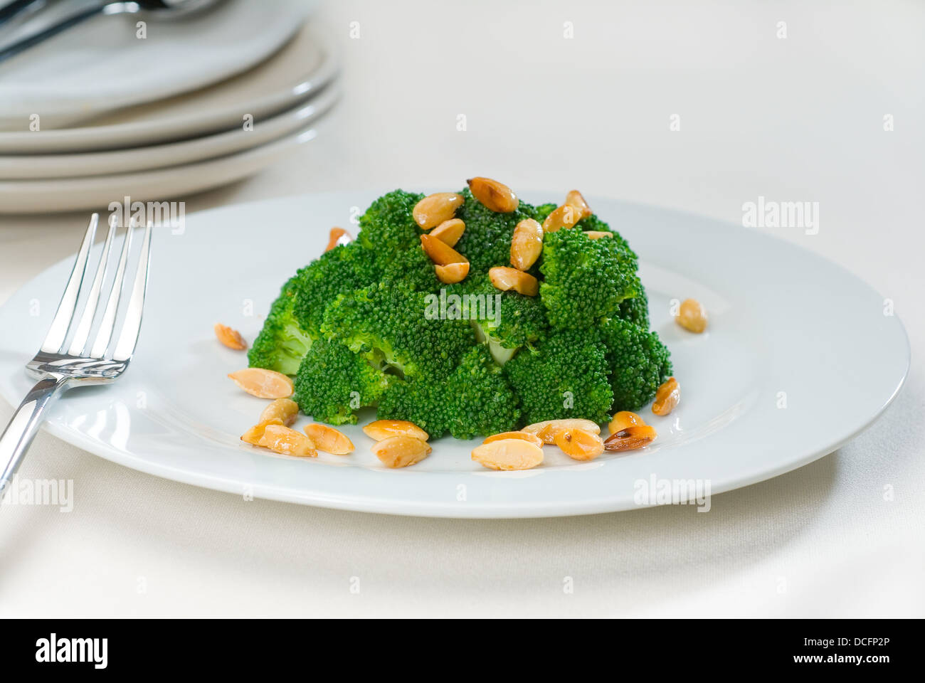 fresh sauteed broccoli and almonds Stock Photo - Alamy