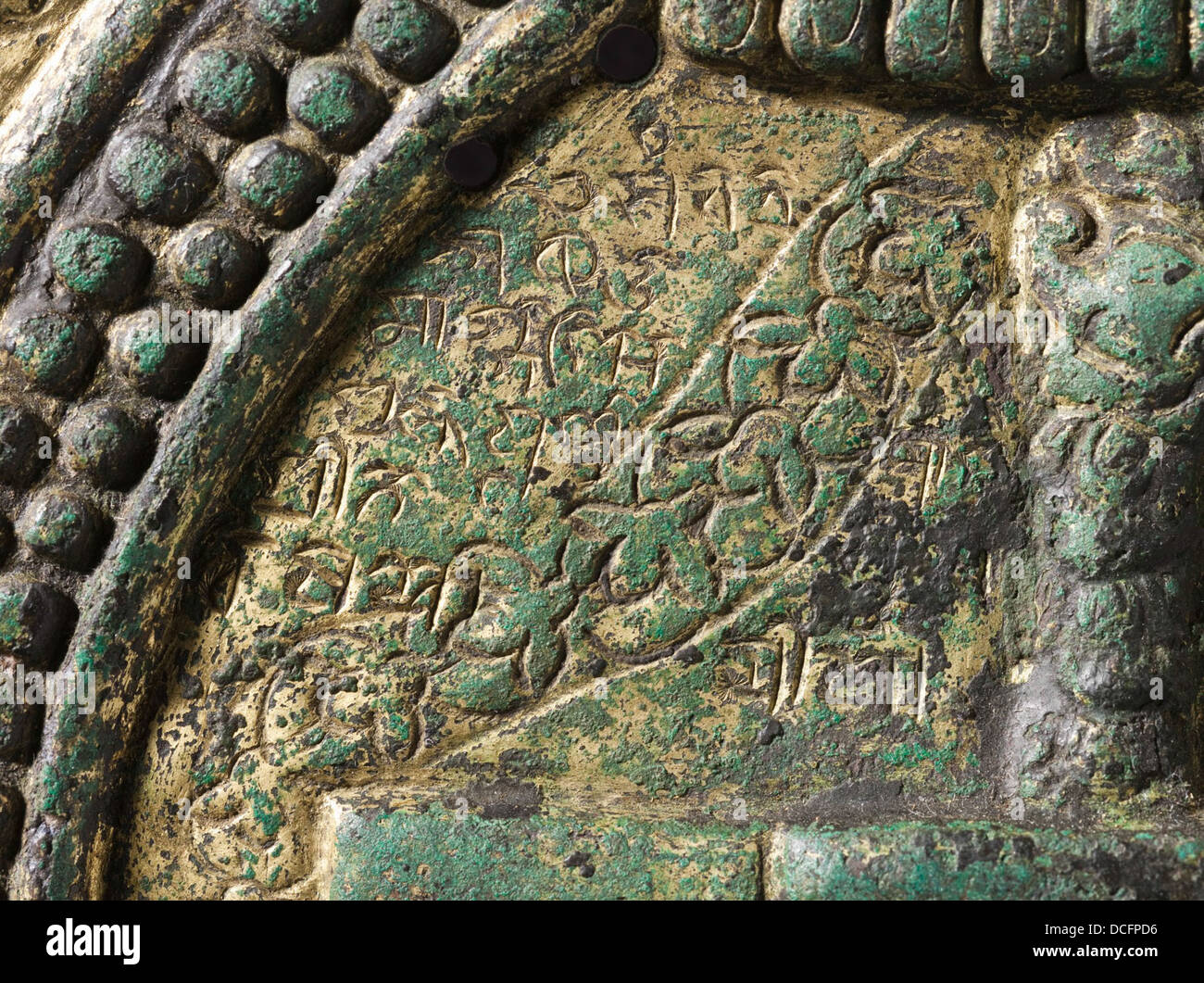 This bronze plaque depicts a Shivalinga, a sacred Hindu symbol ...