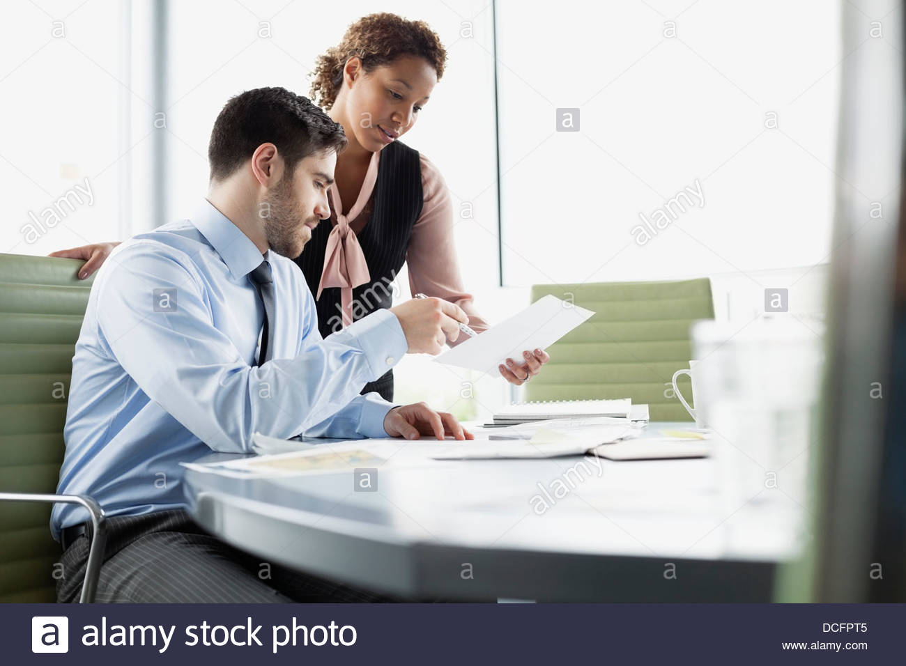 Business people reviewing documents hi-res stock photography and images ...