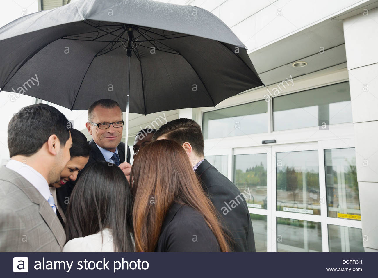 One person with an umbrella hi-res stock photography and images - Alamy