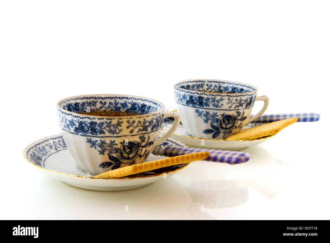 porcelain cups and saucers with tea Stock Photo - Alamy