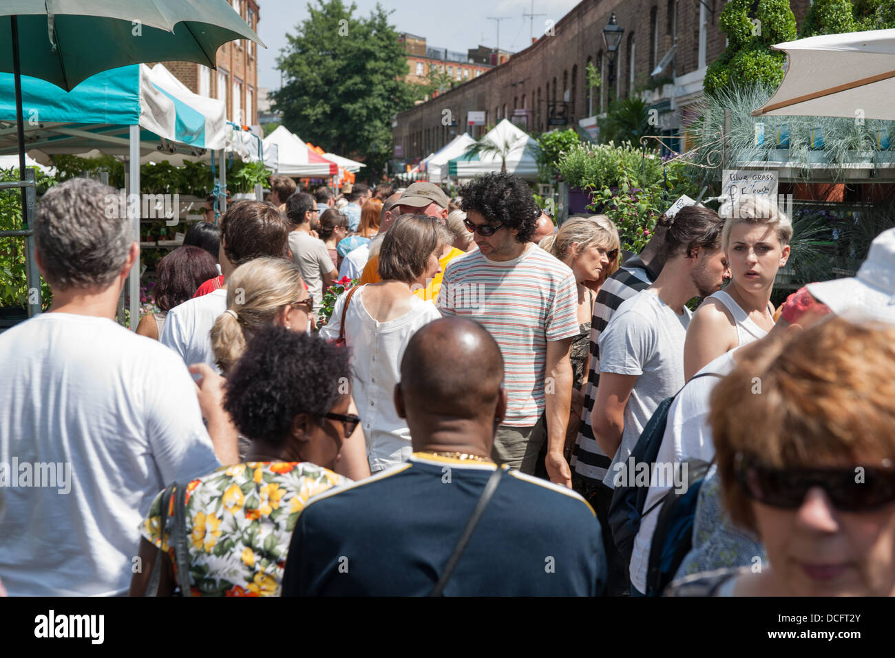 Many people crowd walking along hi-res stock photography and images - Alamy