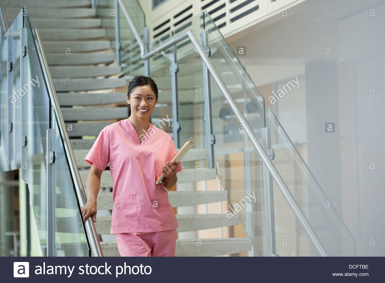 Nurse walking down steps hi-res stock photography and images - Alamy
